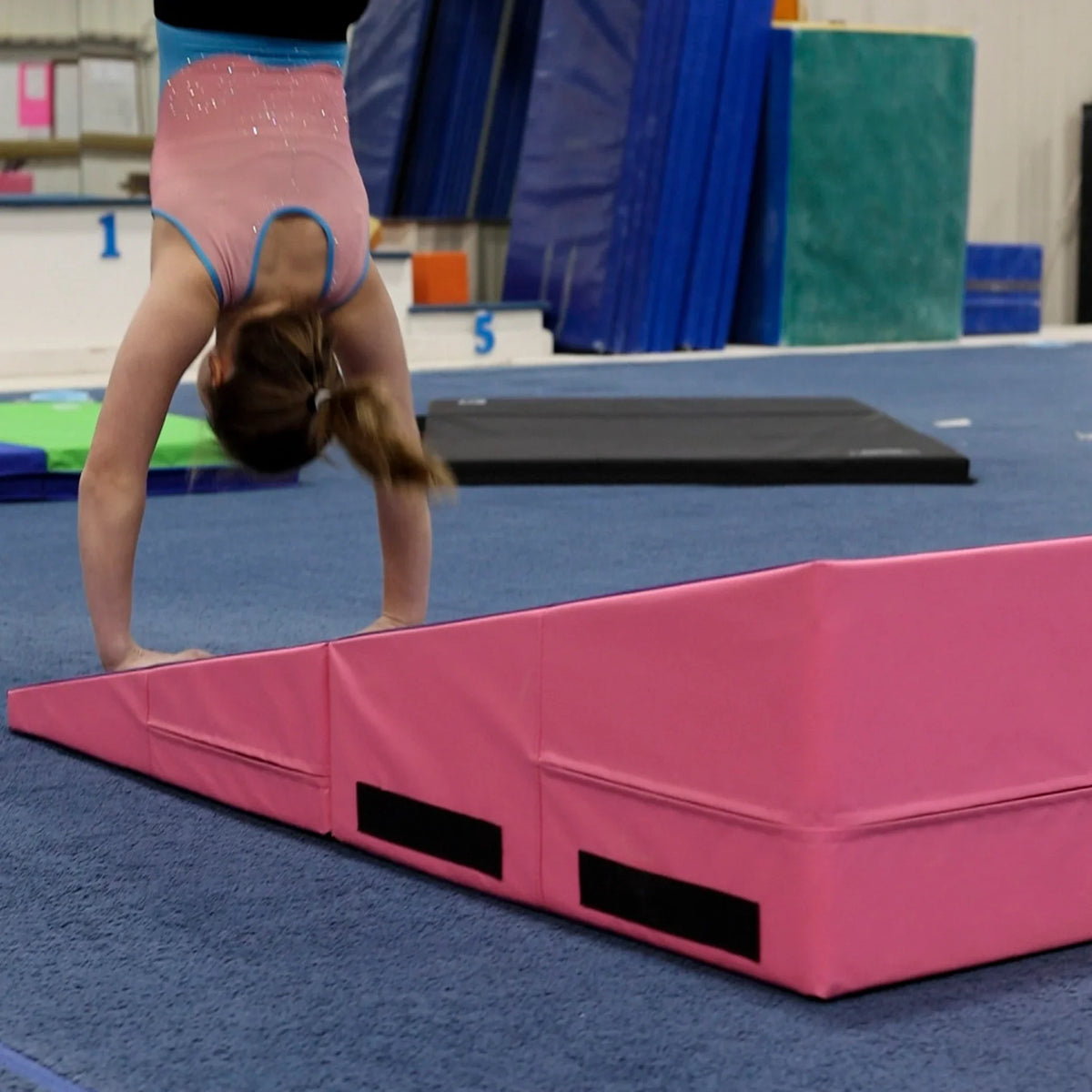 Self-Leveling Gymnastics Mats for Uneven Training Floors